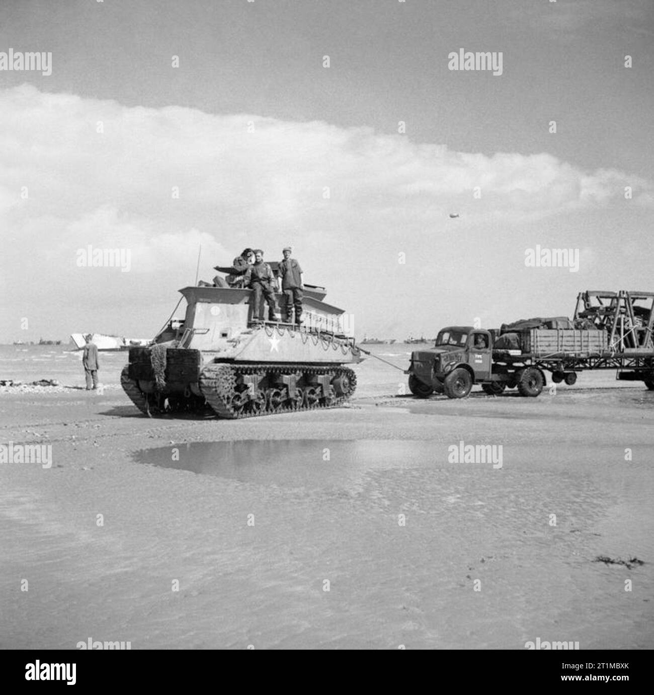 The British Army in the Normandy Campaign 1944 A Sherman BARV tows a ...