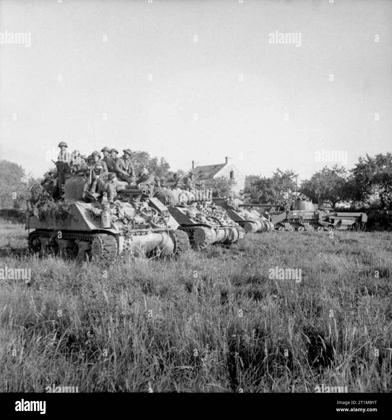 The British Army in the Normandy Campaign 1944 Sherman tanks carrying ...