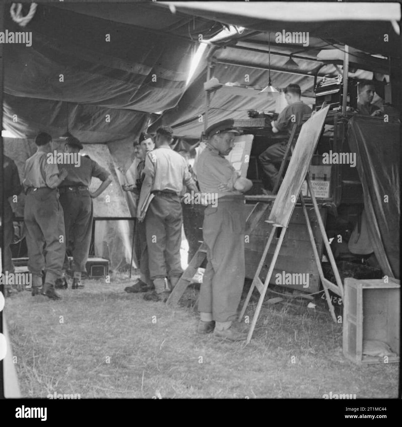 The British Army in the Normandy Campaign 1944 Officers study maps at ...