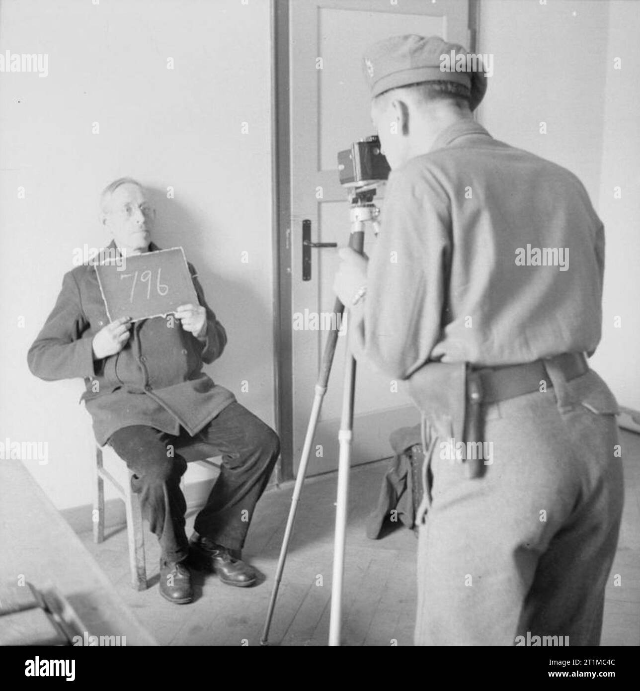 Detainee led Black and White Stock Photos & Images - Alamy
