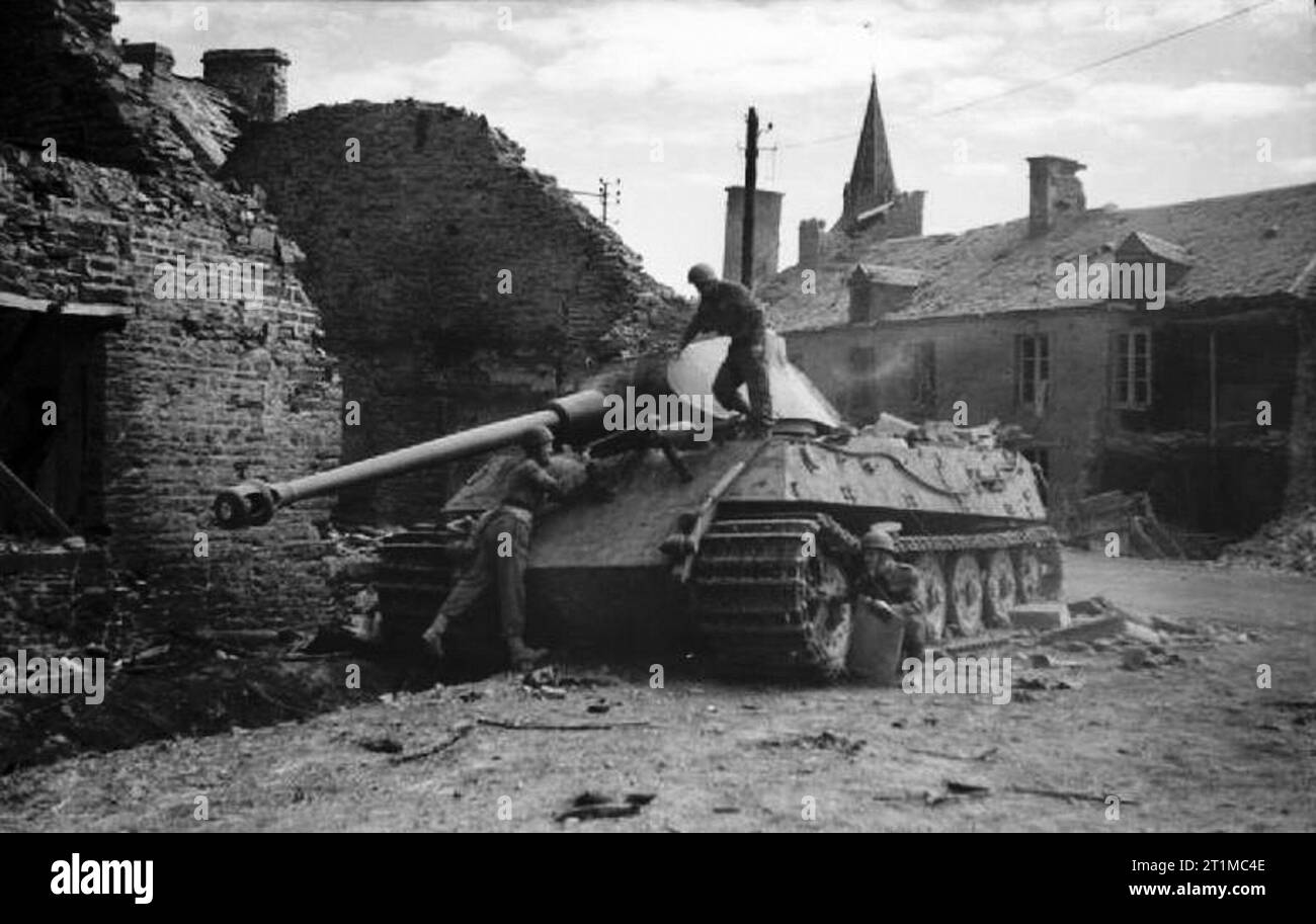 The British Army in the Normandy Campaign 1944 Troops inspect a knocked ...