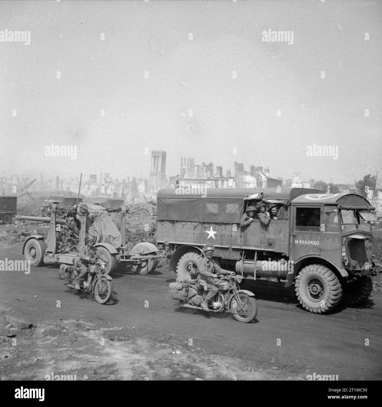 The British Army in the Normandy Campaign 1944 3.7-inch gun being towed ...