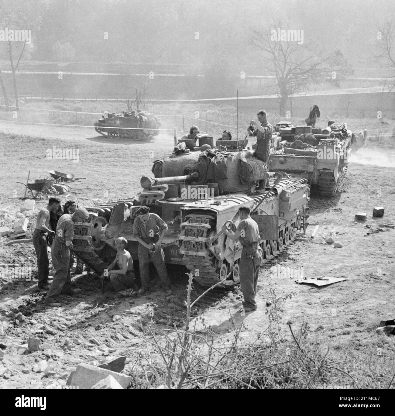 The British Army in the Normandy Campaign 1944 A recovery crew works on ...