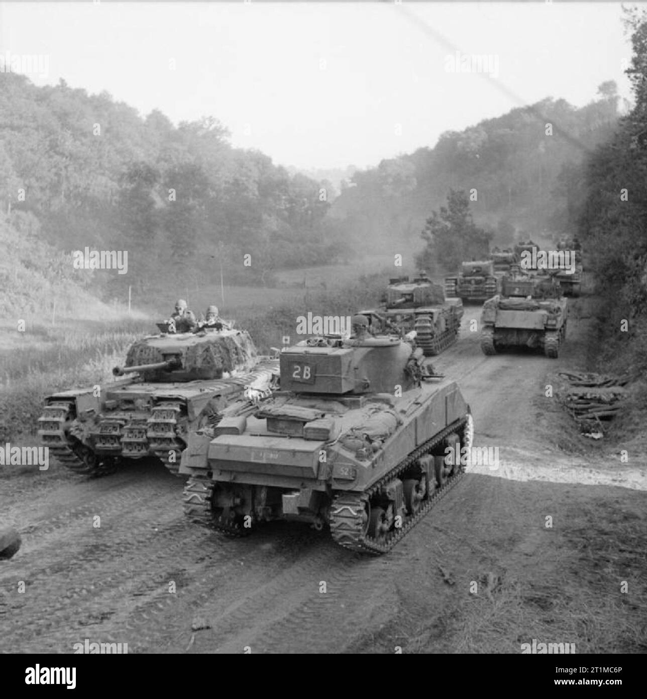 The British Army in the Normandy Campaign 1944 Sherman tanks pass a ...