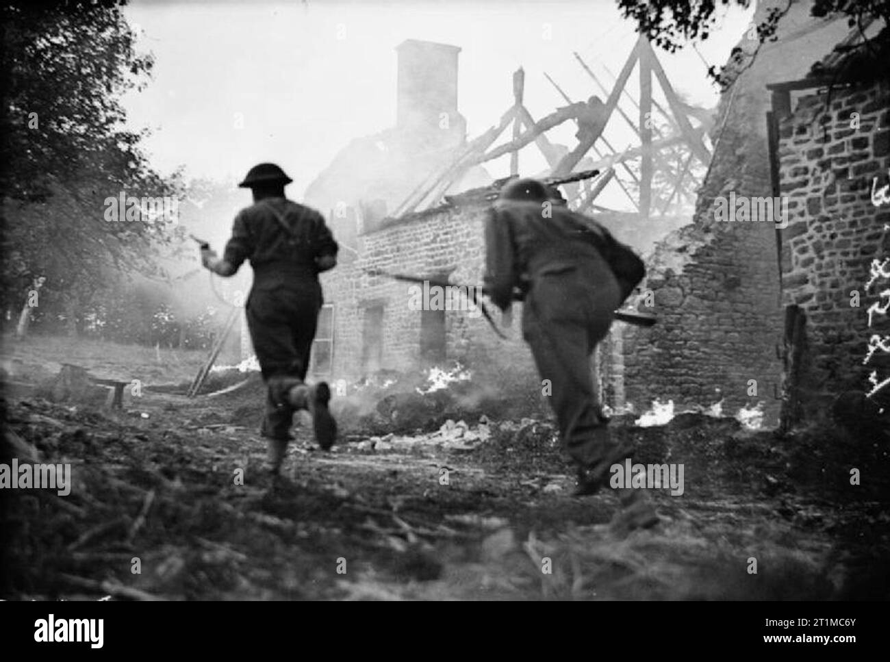 The British Army in the Normandy Campaign 1944 Infantry rush past a ...