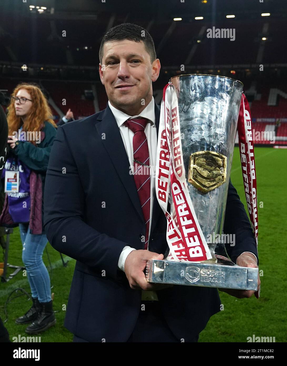 Wigan Warriors head coach Matt Peet poses with the trophy after the ...