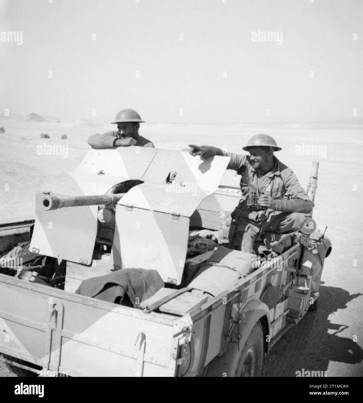 A lorry mounted anti-tank gun in the Western Desert being manned by New Zealand LRDG troops as ...