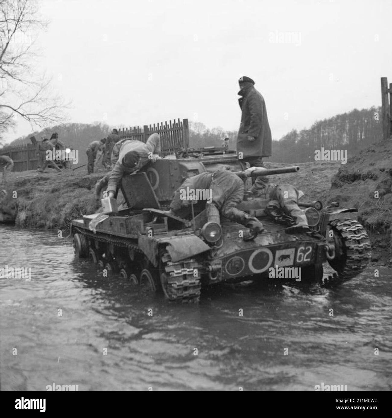 The British Army in the United Kingdom 1939-45 A recovery team works on a Valentine tank of 30th ...