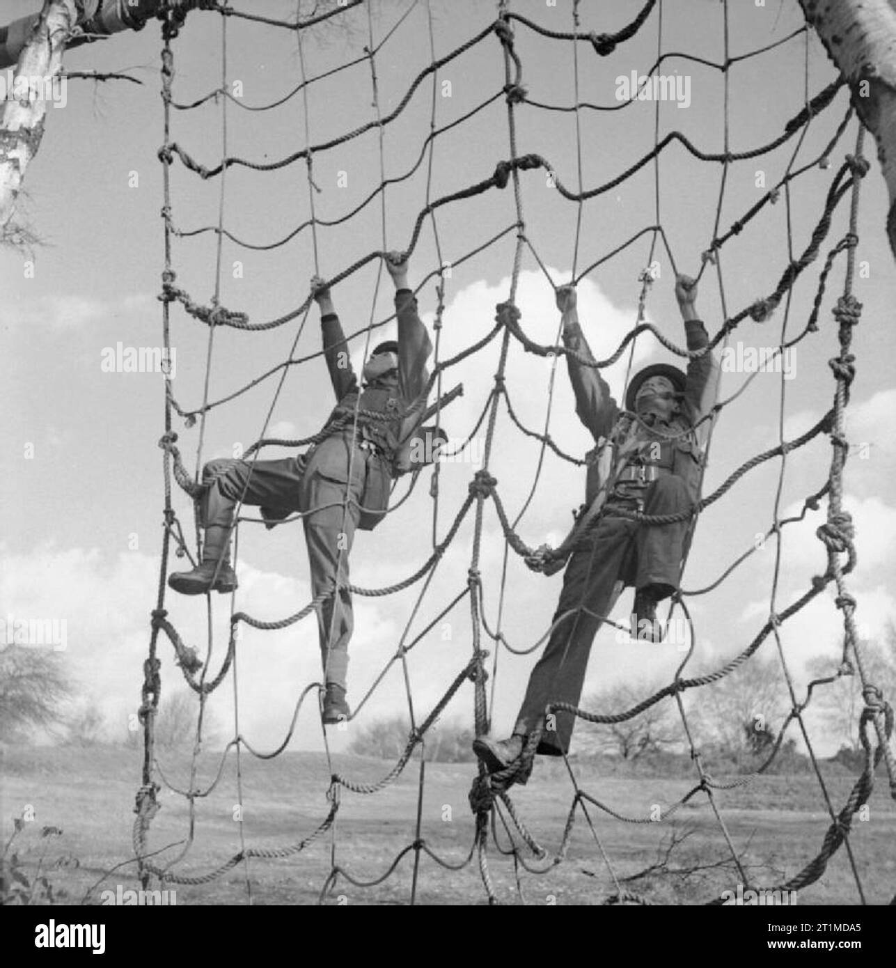 The British Army in the United Kingdom 1939-45 Soldiers climbing a ...