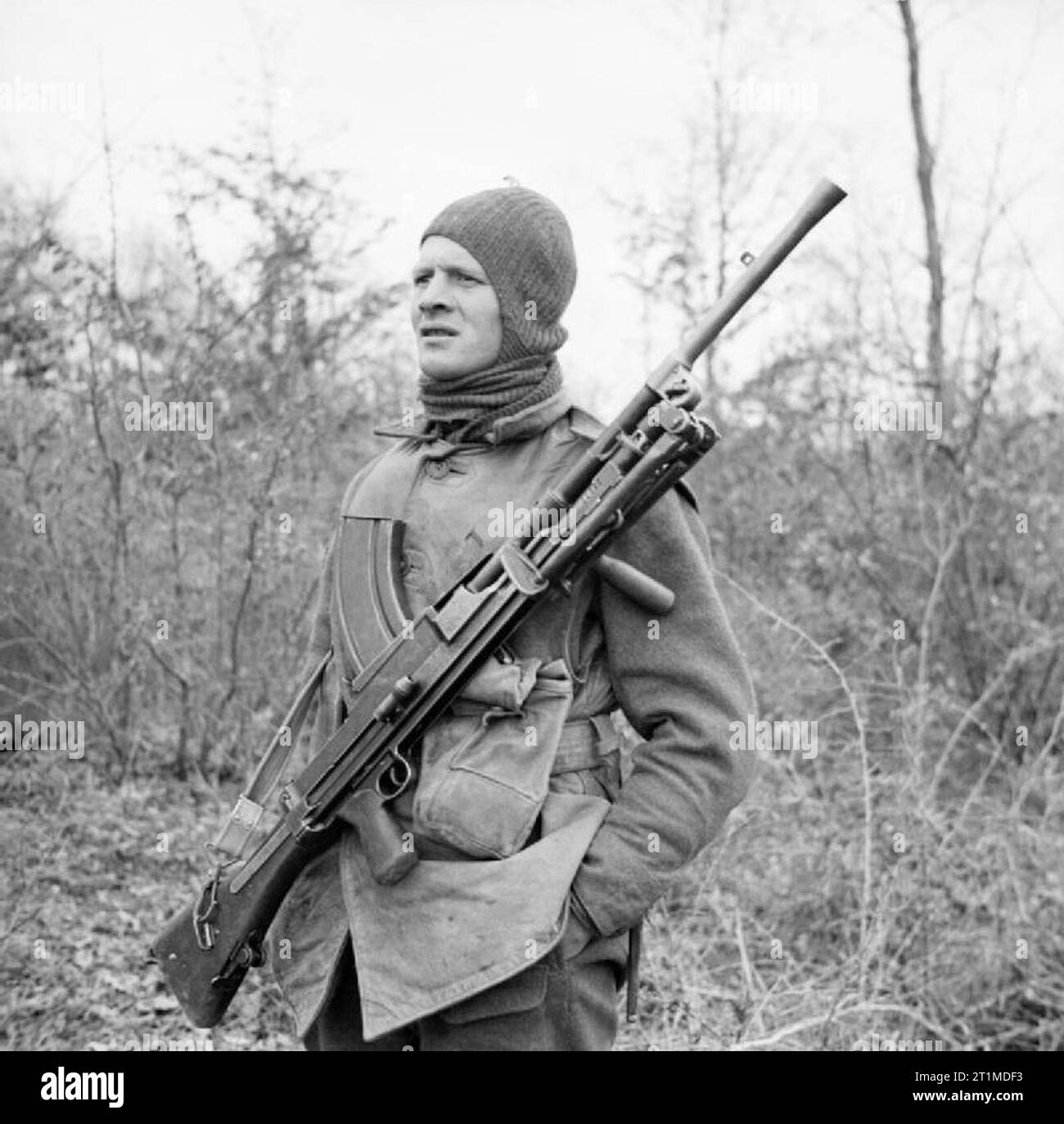 A member of No. 9 Commando at Anzio, equipped for a patrol with his ...