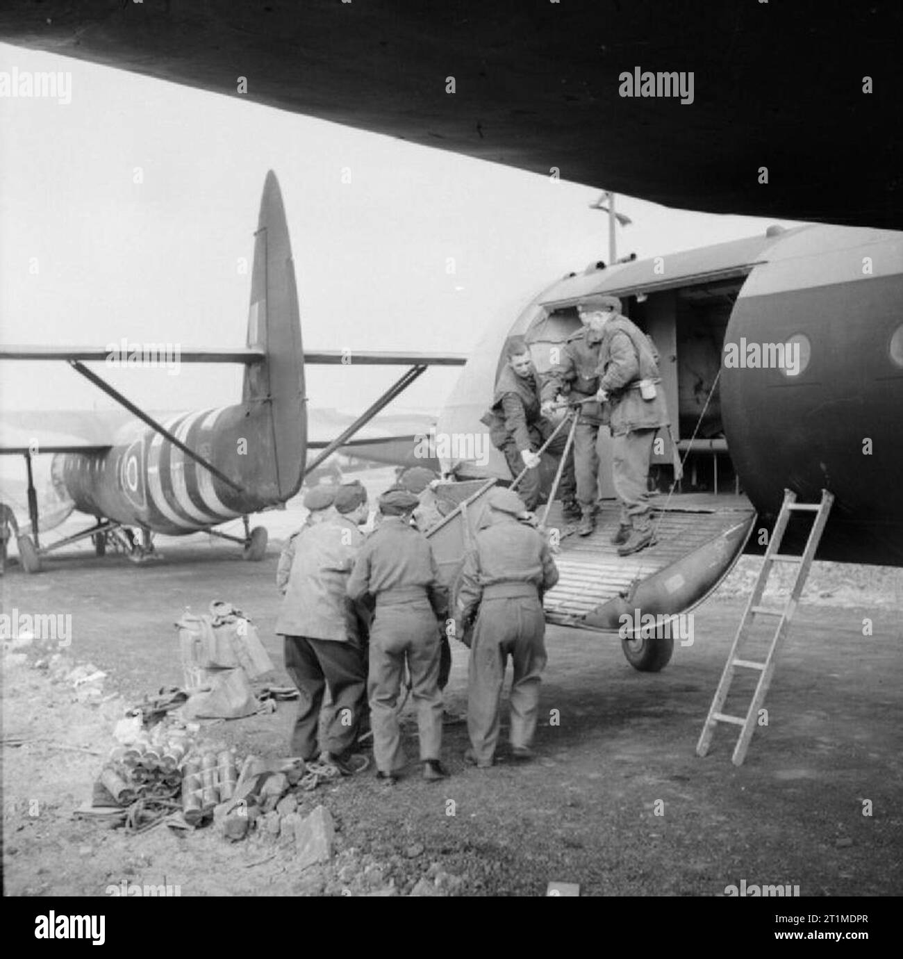 The British Army in the United Kingdom 1939-45 A handcart being loaded ...