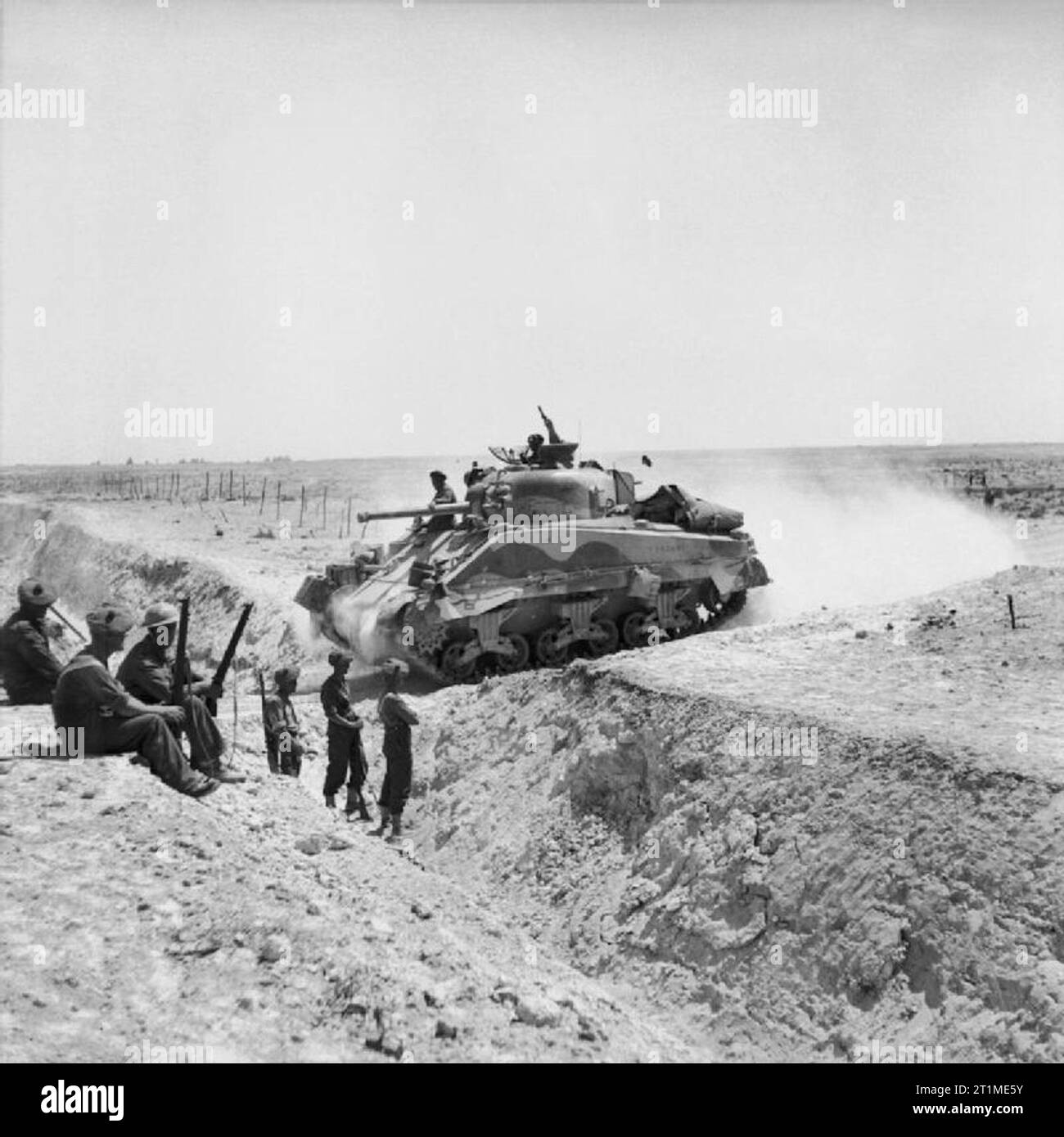 The British Army in Tunisia 1943 A Sherman tank crosses an anti-tank ...