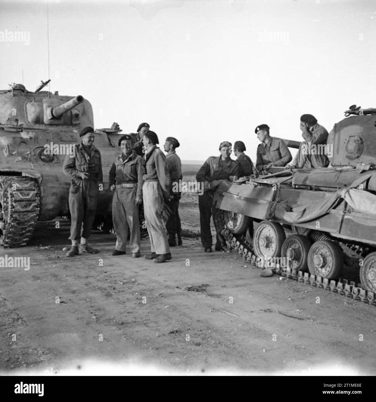 The British Army in Tunisia 1943 A Sherman tank crew greets a Valentine ...