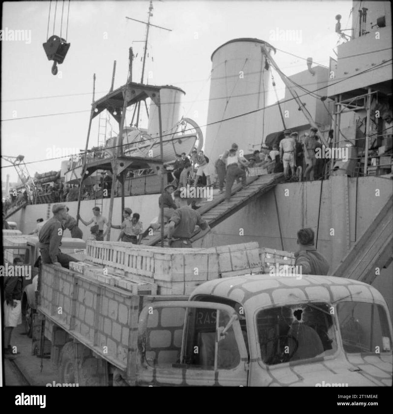 The British Army on Malta 1942 Crates of powdered milk and foodstuffs ...