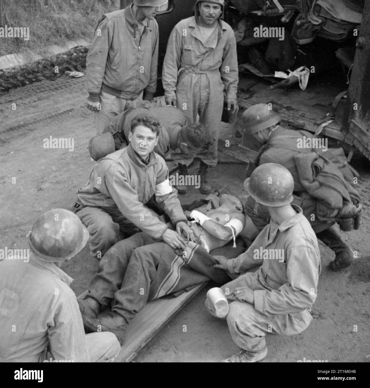 The Campaign in Italy 1944 US Army and captured German medics attend to ...