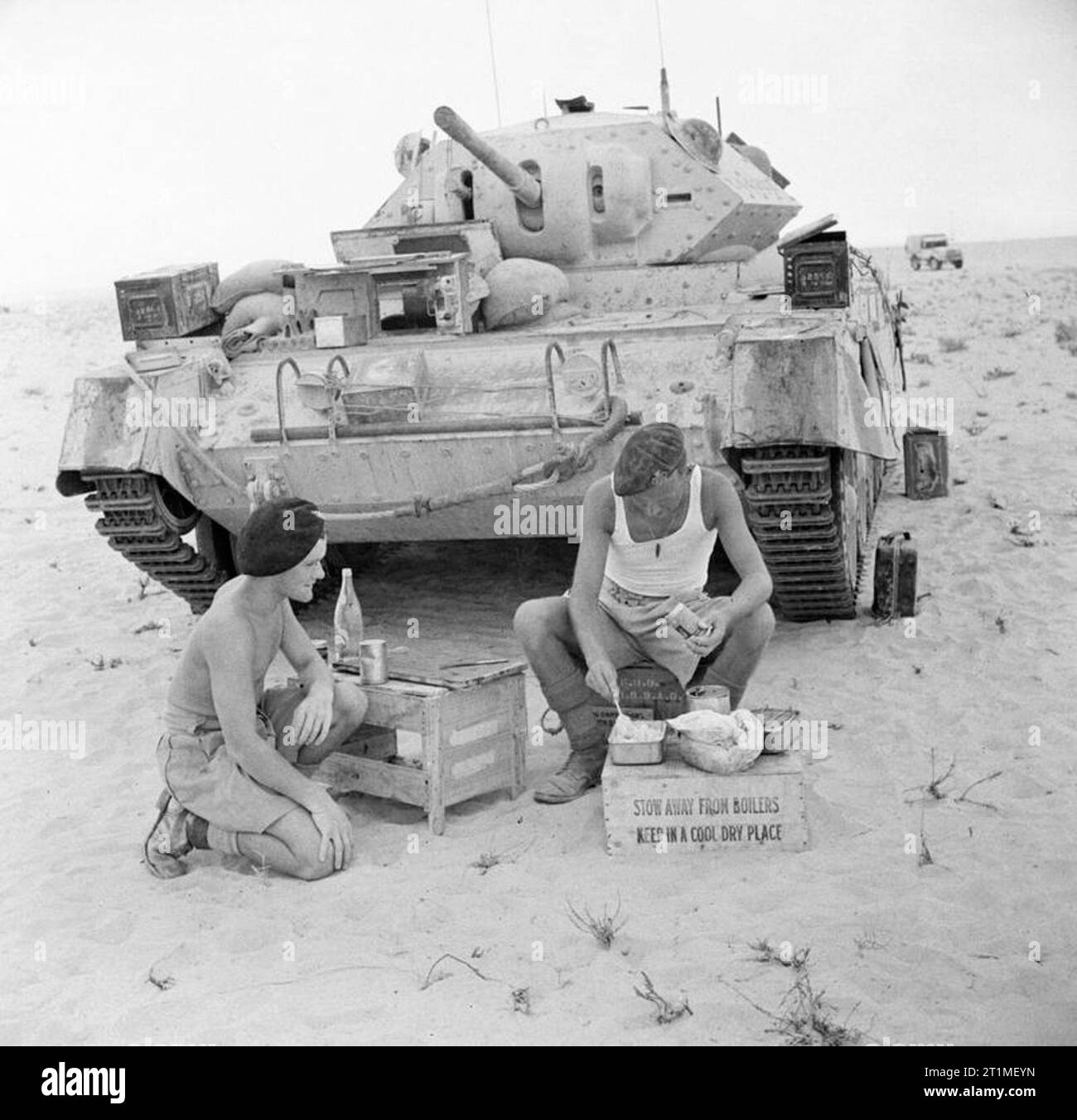 The crew of a Crusader tank prepare a meal in the Western Desert, 20 ...