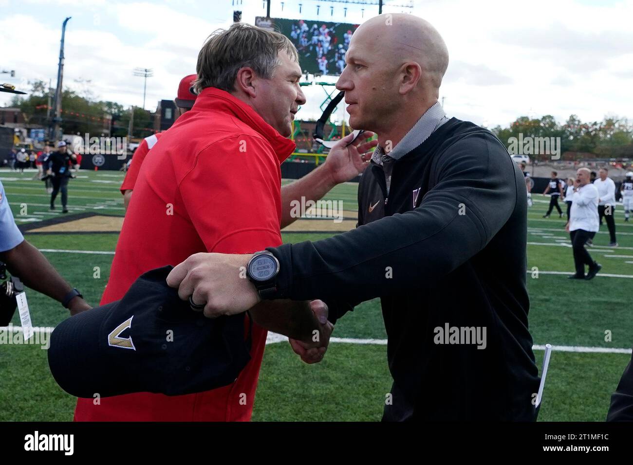 Georgia head coach Kirby Smart, left, shakes hands with Vanderbilt head ...