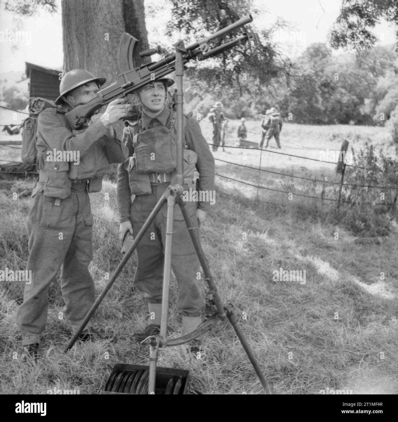 The Home Guard 1939-45 Home Guard soldiers fire a Bren gun set up on an ...