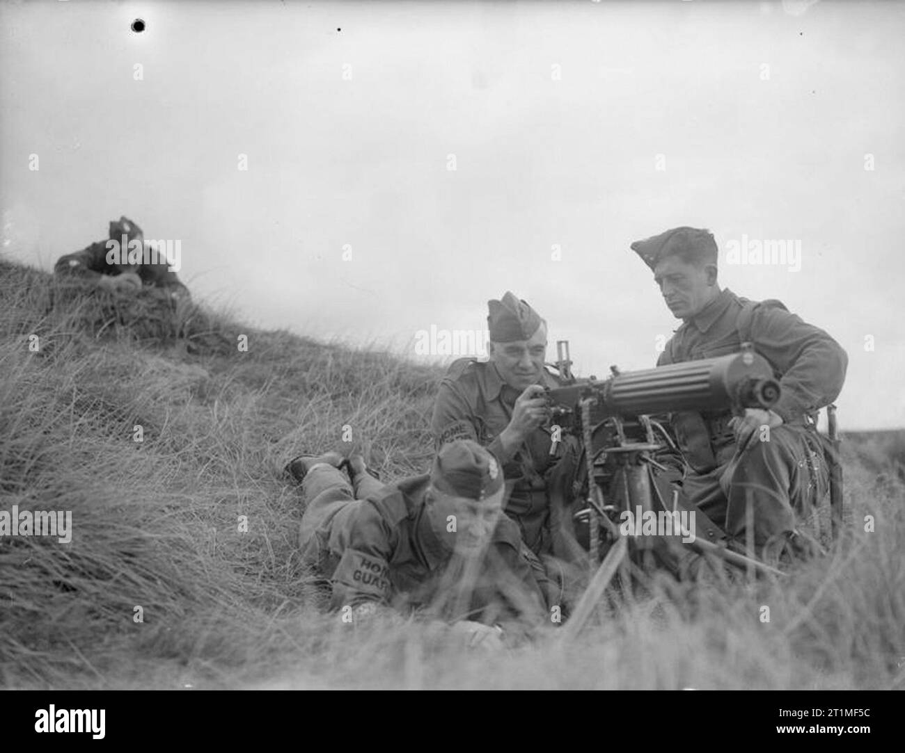 The Home Guard, 1940 Home Guards receiving Vickers gun instruction at ...