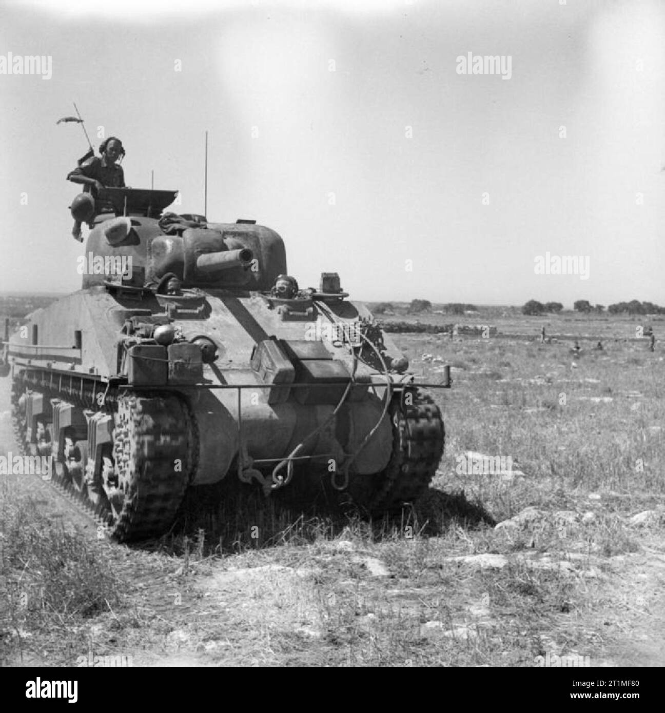 The Invasion of Sicily July 1943 A Sherman tank moves into action, 10 ...