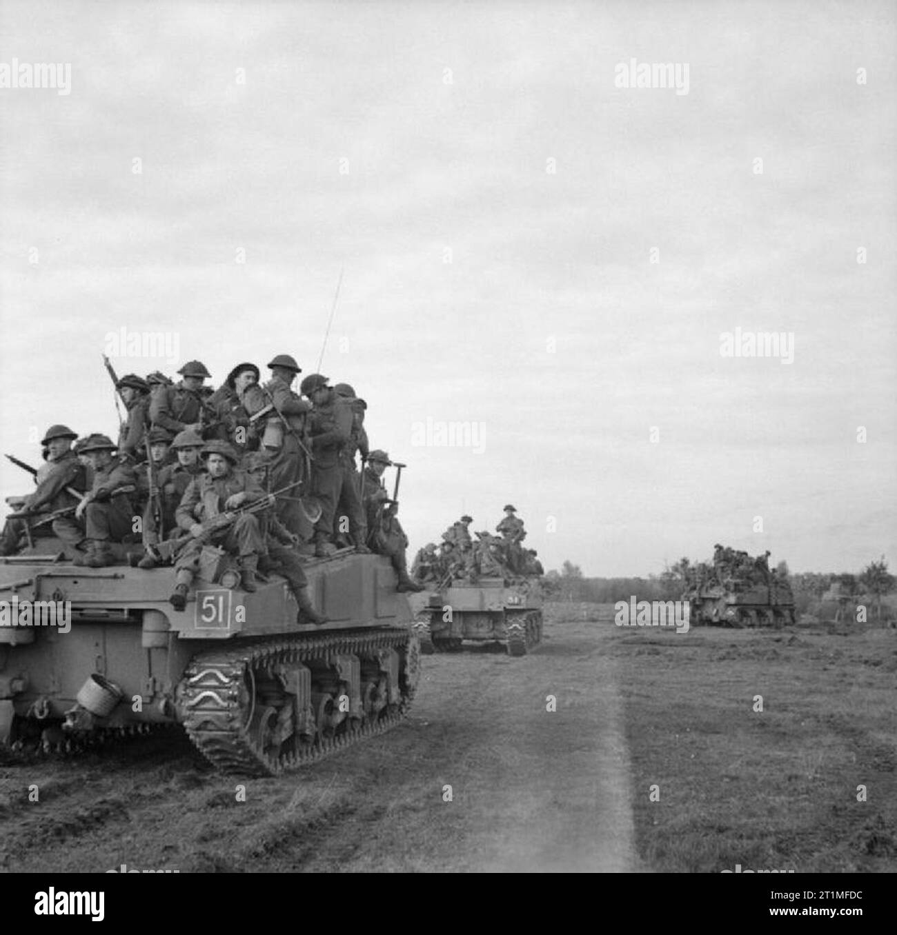 Infantry of 51st Highland Division are carried into battle aboard ...