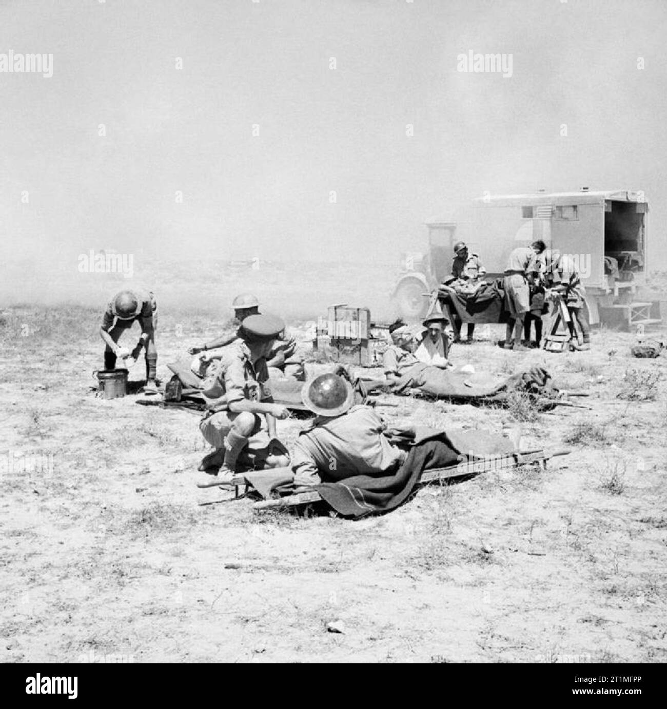 British wounded and medical staff at a field dressing station in the ...