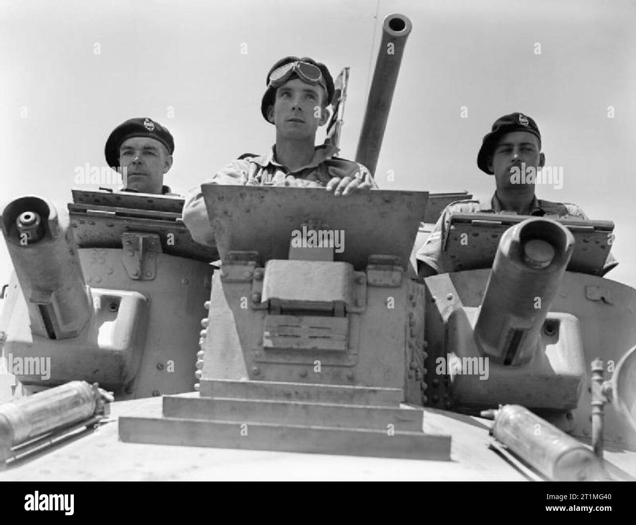 Turret crew of a 1st Royal Tank Regiment A9 Cruiser Mk I tank at ...
