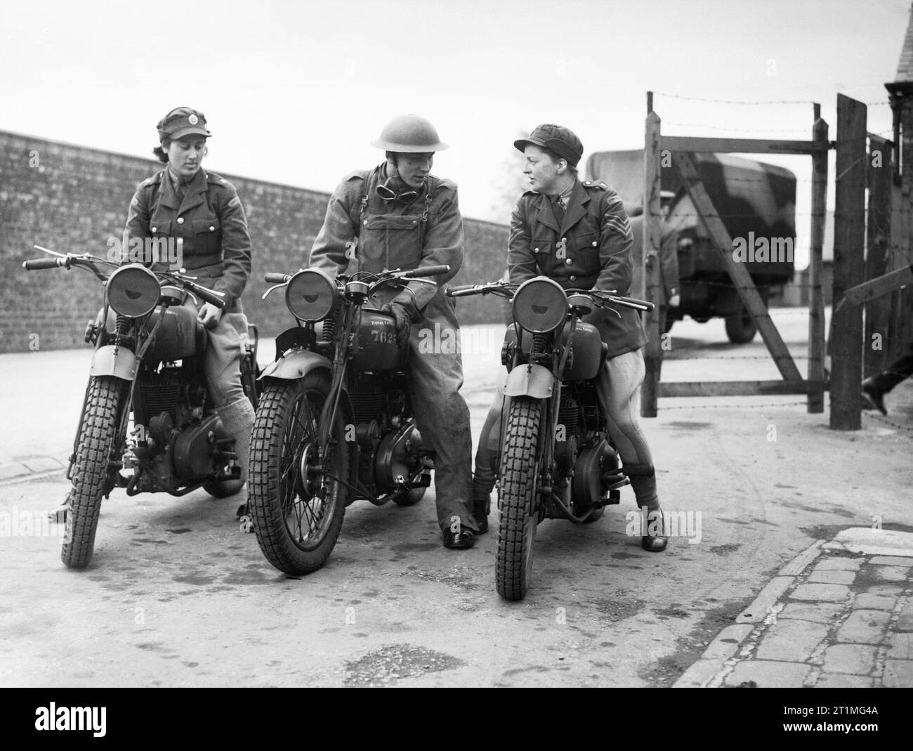 Two ATS (Auxiliary Territorial Service) trainee motorcycle despatch ...