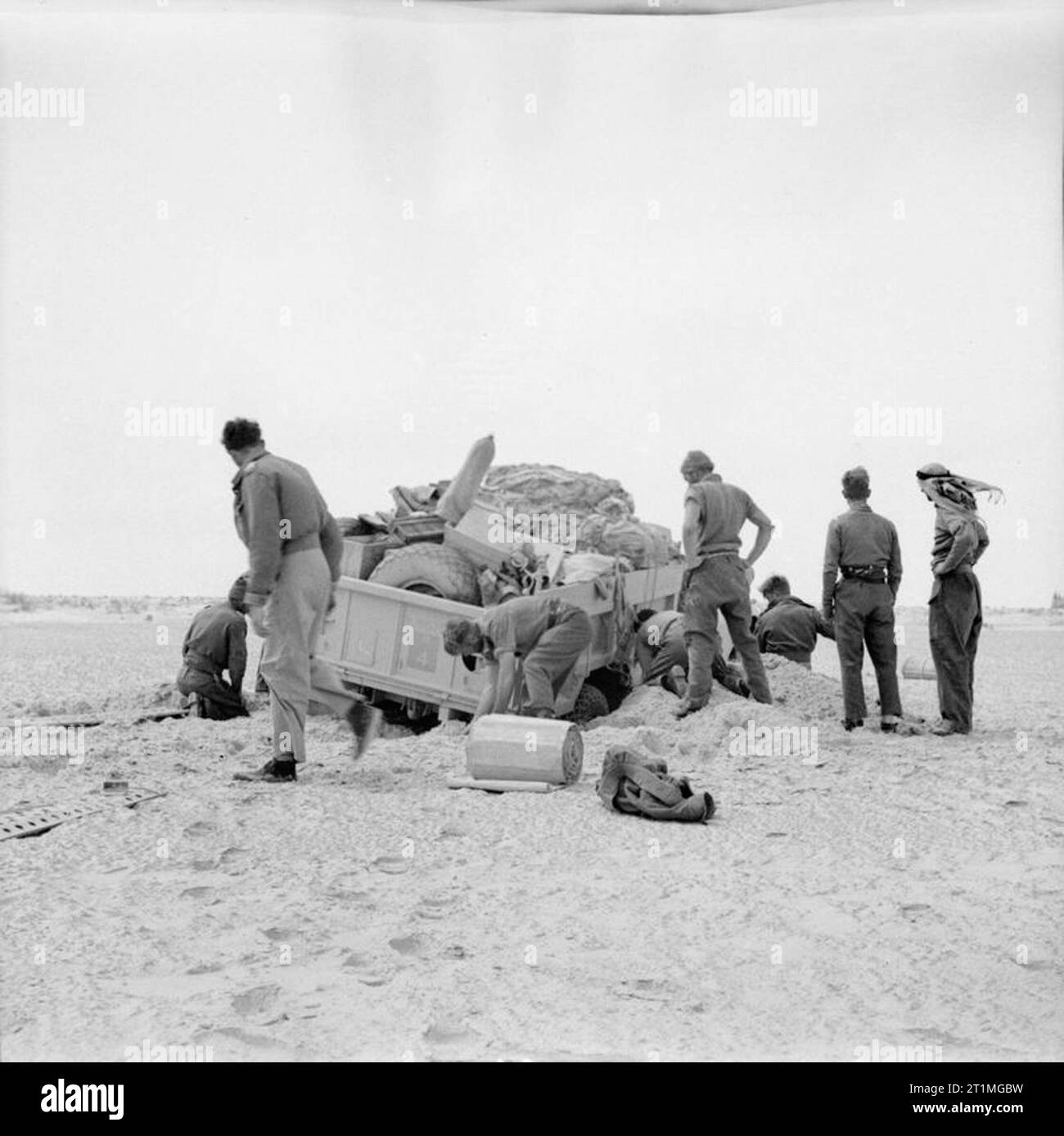 War Office Second World War Official Collection LRDG trucks stuck in ...