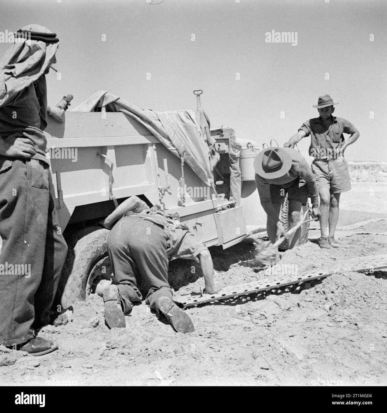 War Office Second World War Official Collection LRDG trucks stuck in ...