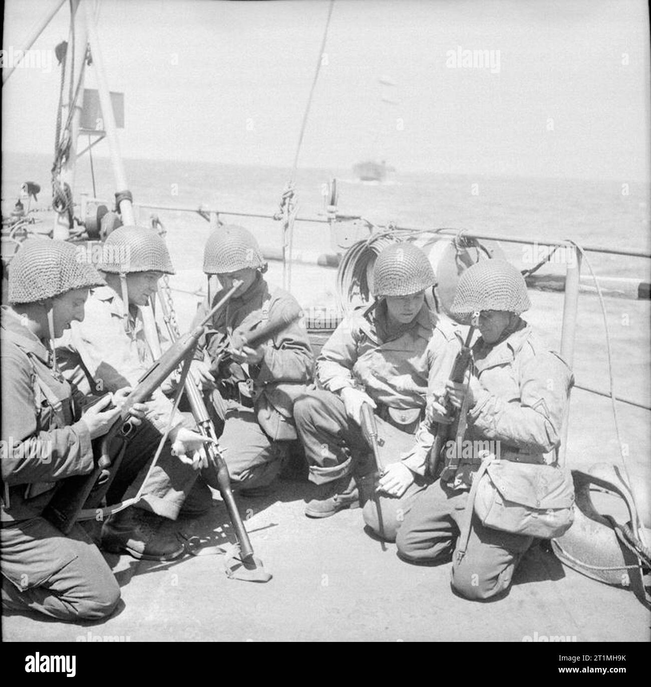 D-day - US Forces during the Invasion of Normandy 6 June 1944 American soldiers of a 155mm self ...