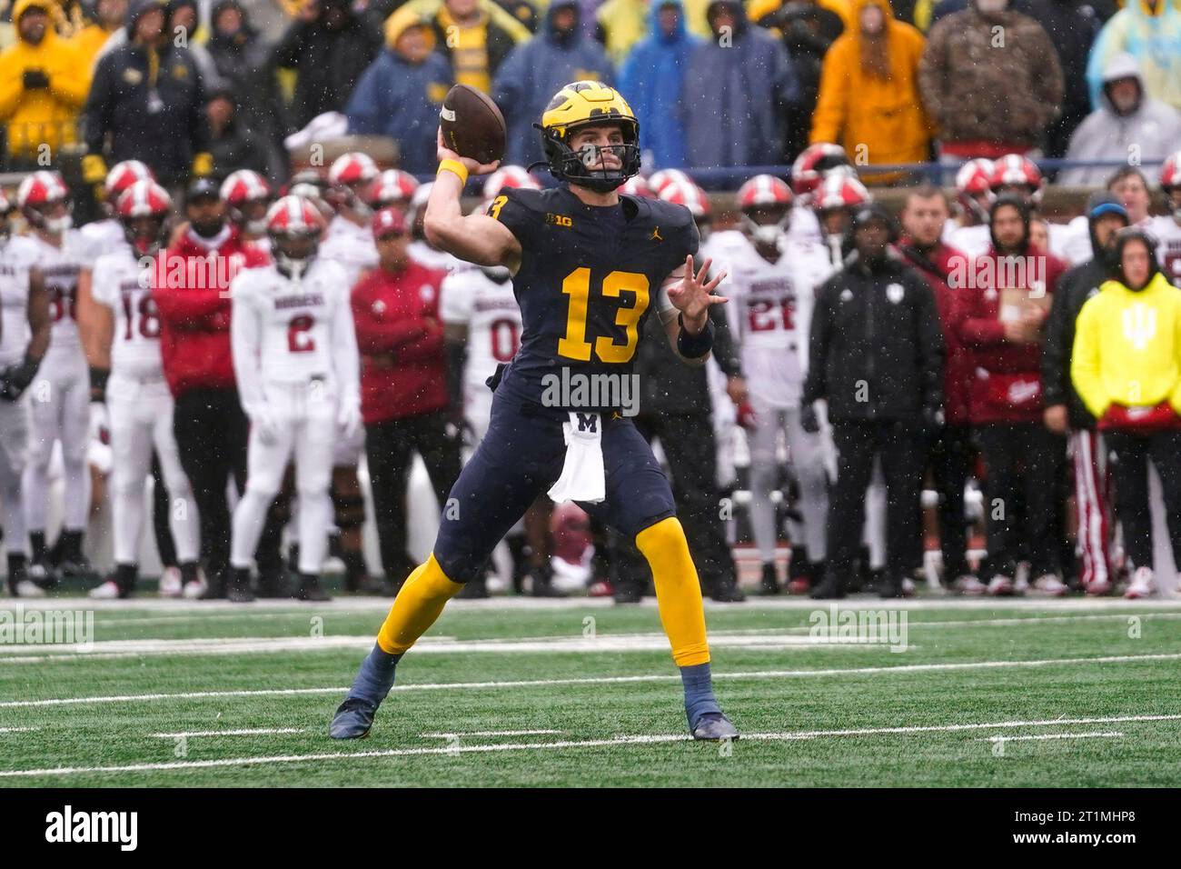 Michigan quarterback Jack Tuttle (13) throws a four-yard touchdown pass ...