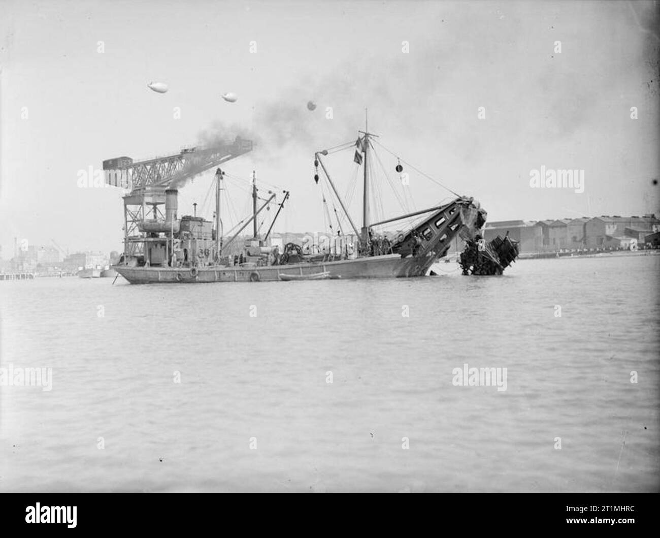 Salvage of HMS Gipsy. 21 March 1943, Felixstowe. Views of a large ...