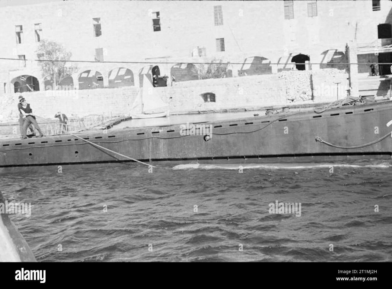 Submarines and Submarine Officers. 4 February 1943, Malta. A torpedo ...