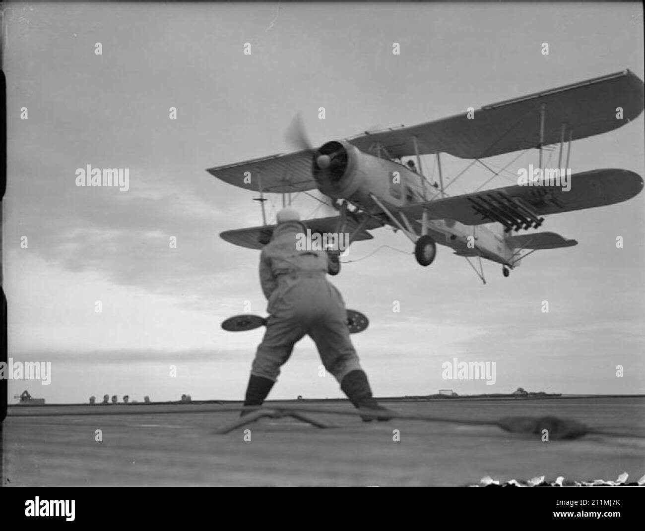 The Royal Navy during the Second World War A batman uses signal bats to ...