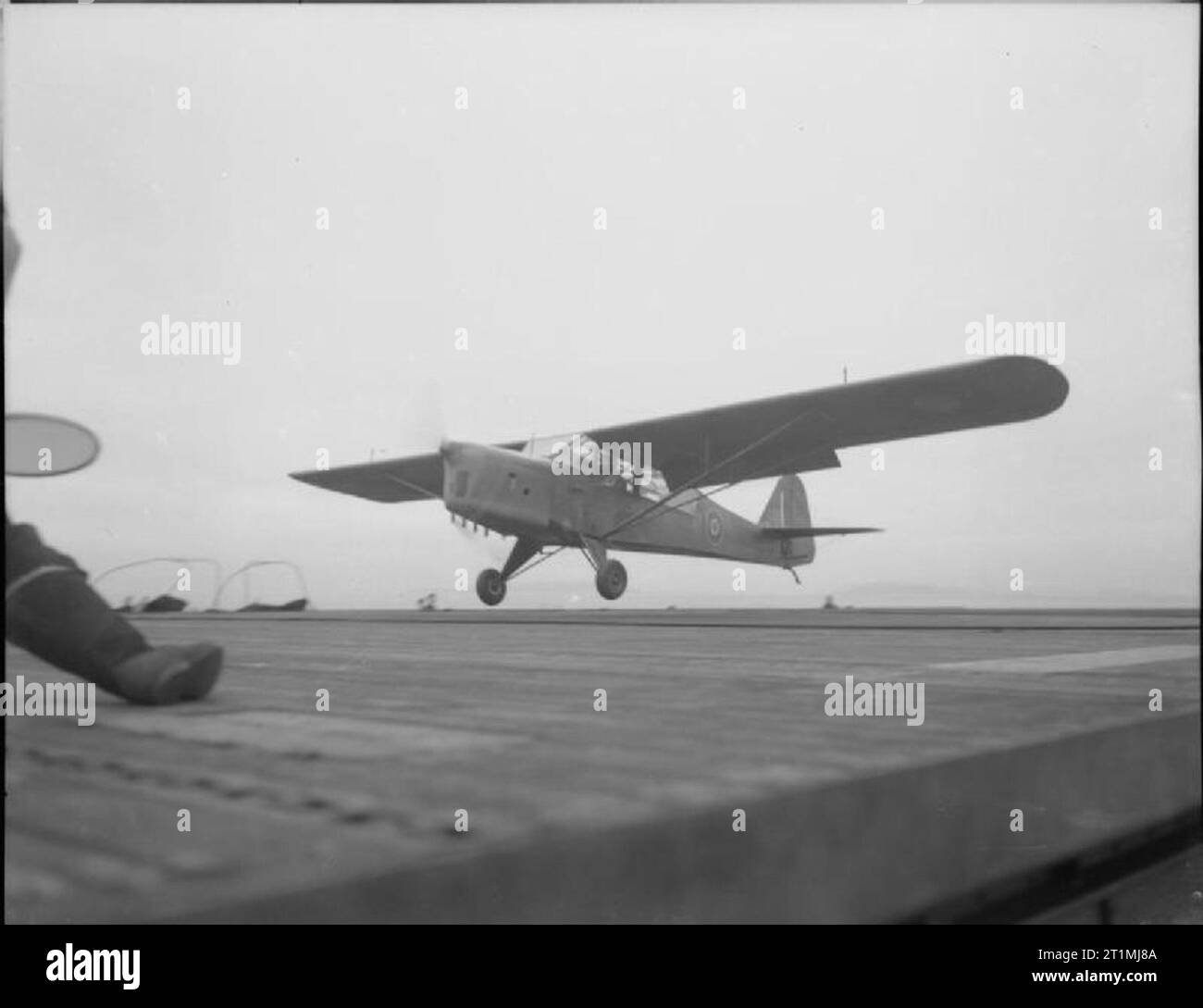 The Royal Navy during the Second World War A Taylorcraft Auster landing ...