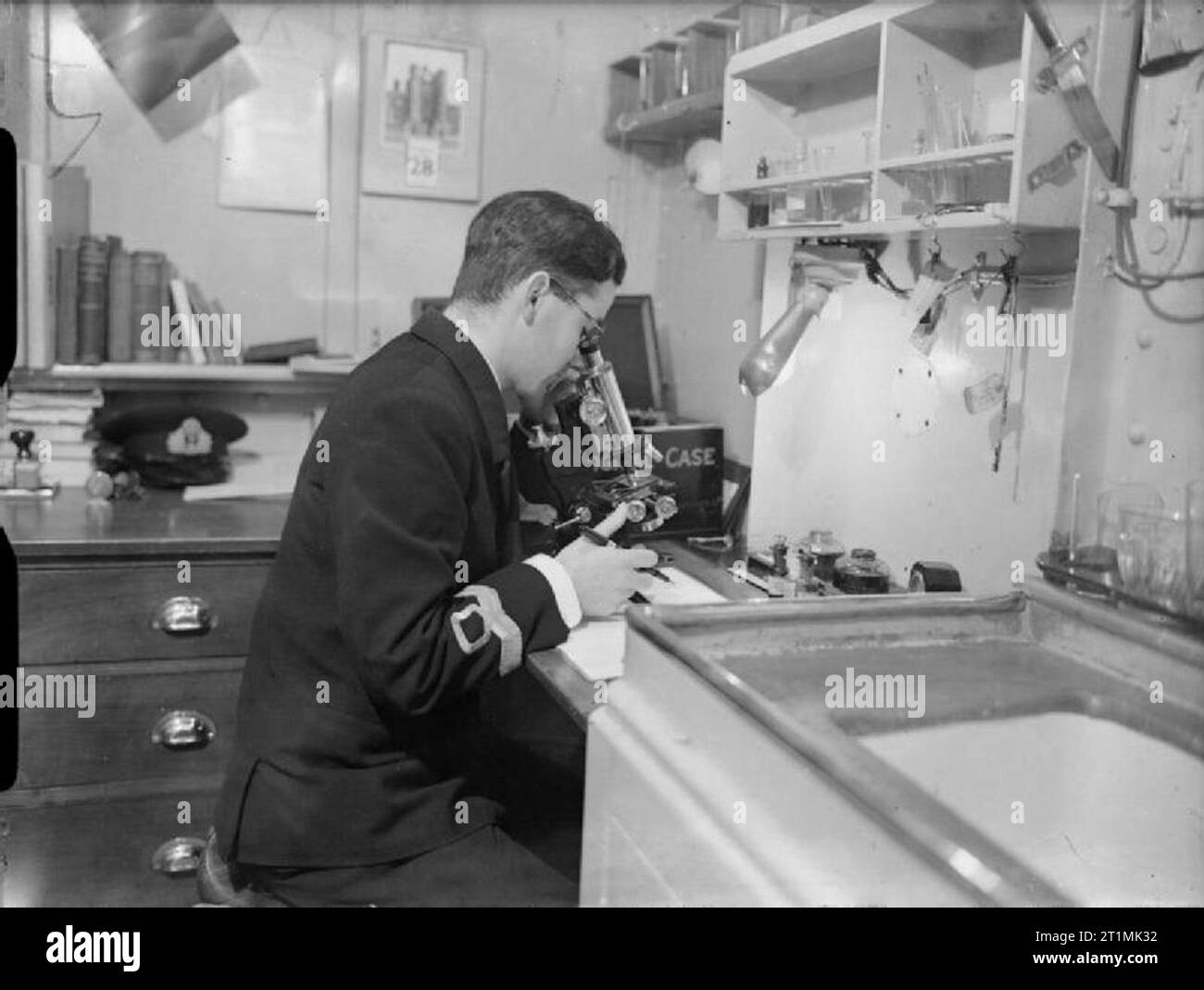 The Royal Navy during the Second World War A Surgeon Lieutenant, seated ...