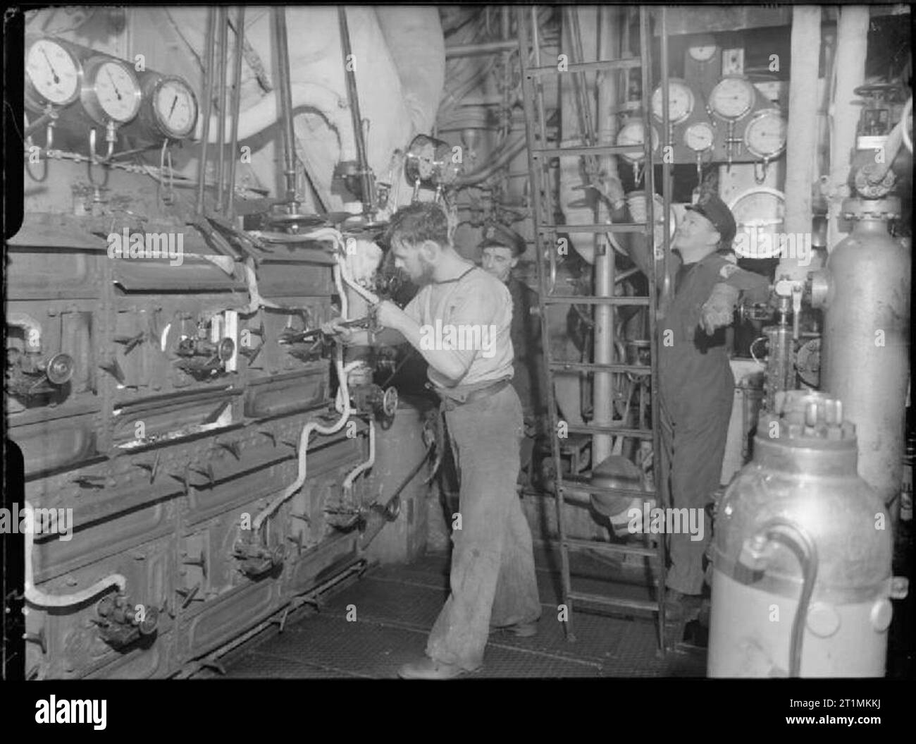 The Royal Navy during the Second World War A scene showing two stokers ...