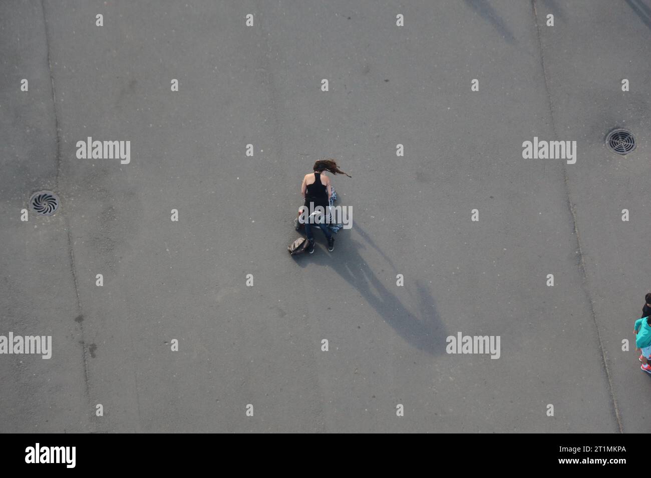 Observing from the Eiffel Tower as a couple is busy being mischievous ...
