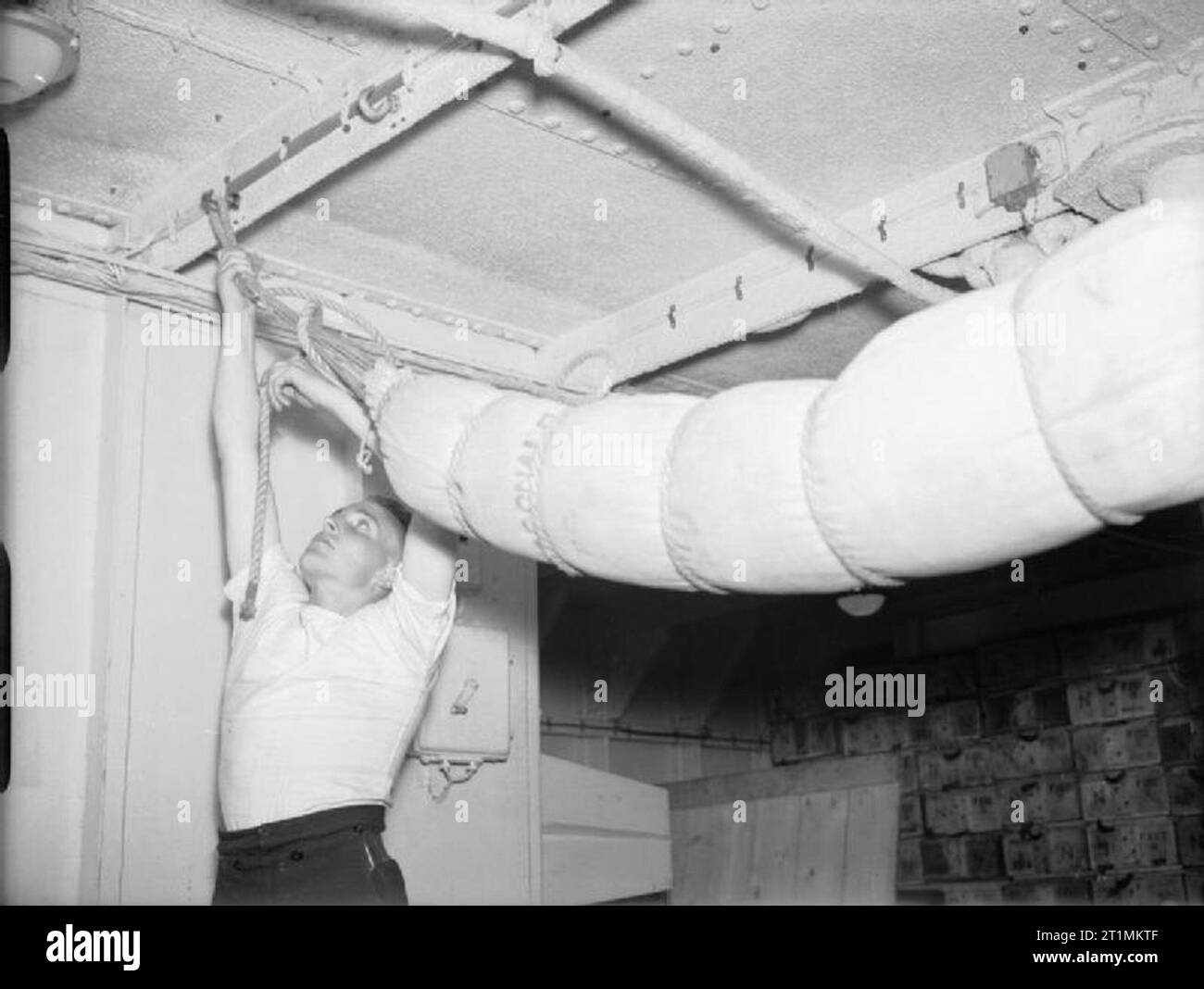 The Royal Navy during the Second World War A sailor secures a rolled ...