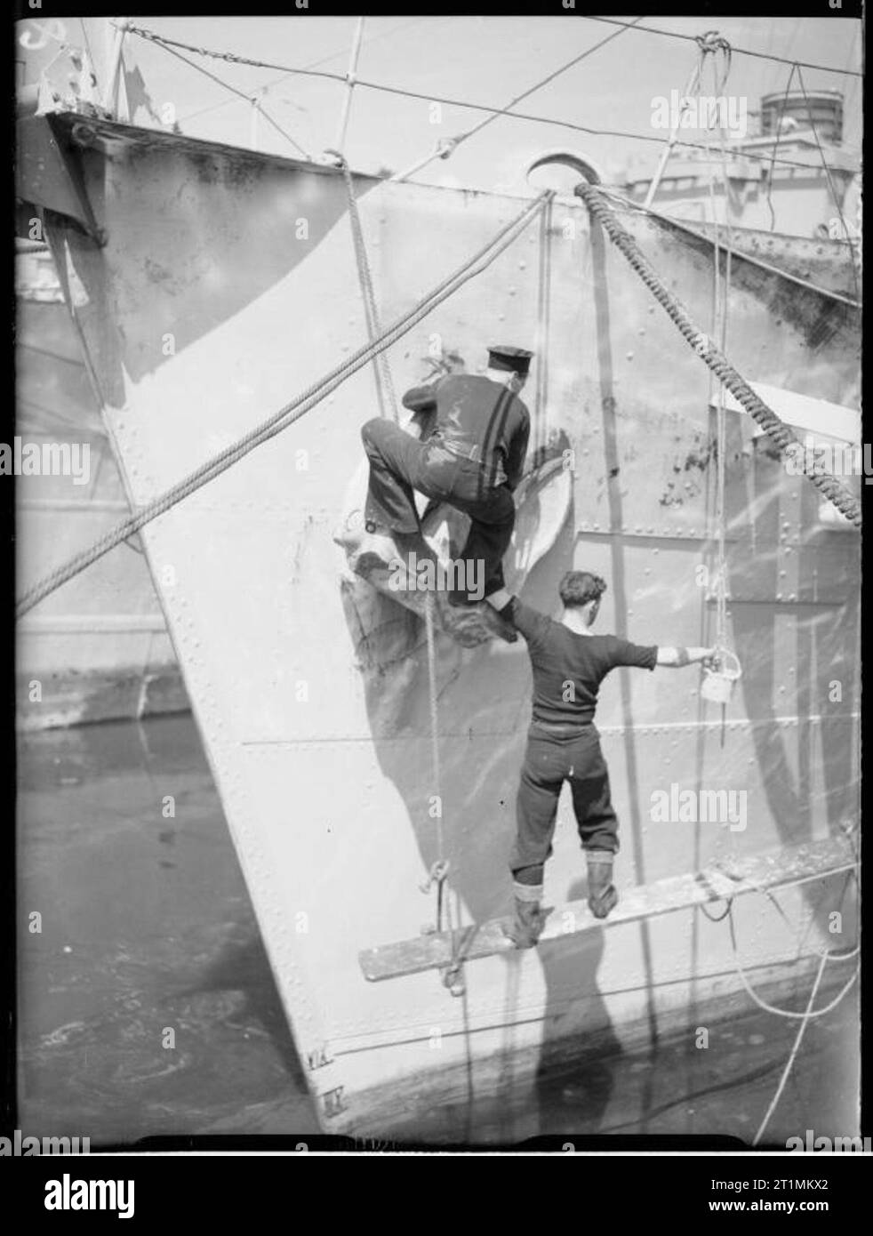The Royal Navy during the Second World War Two sailors, standing on ...