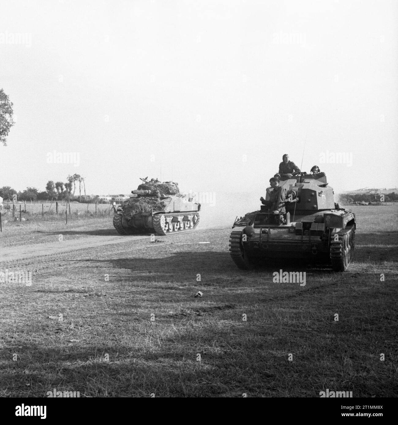A Sherman tank and Crusader anti-aircraft tank of the Staffordshire ...