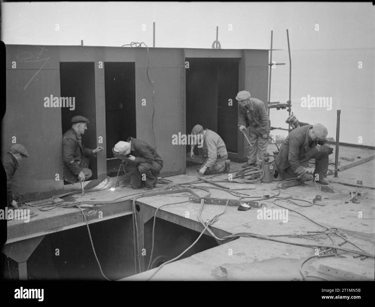 The Royal Navy during the Second World War Welders at work on the deck ...