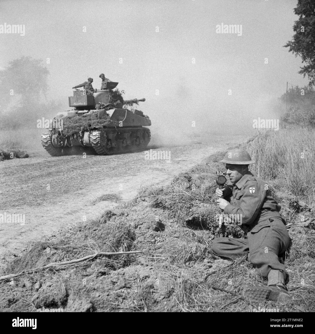 Pierre Lefevre, a Free French war correspondent, making a broadcast as ...