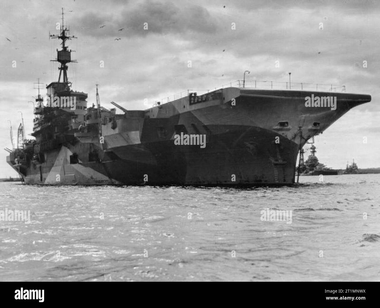 The Royal Navy during the Second World War HMS INDEFATIGABLE at anchor ...