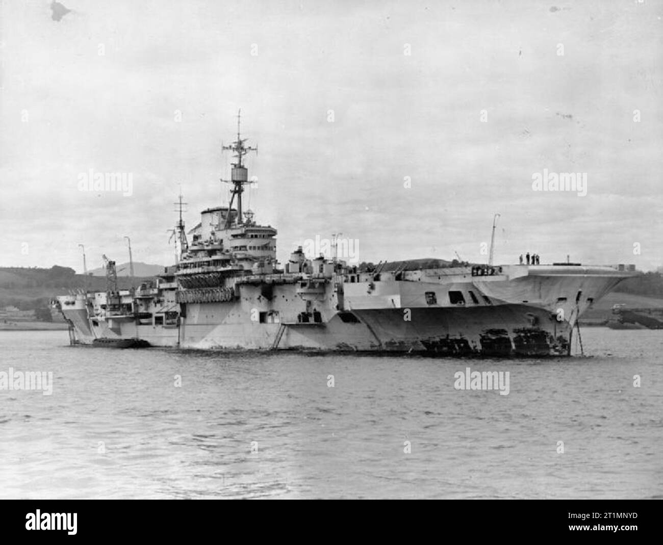 The Royal Navy during the Second World War HMS IMPLACABLE at anchor off ...