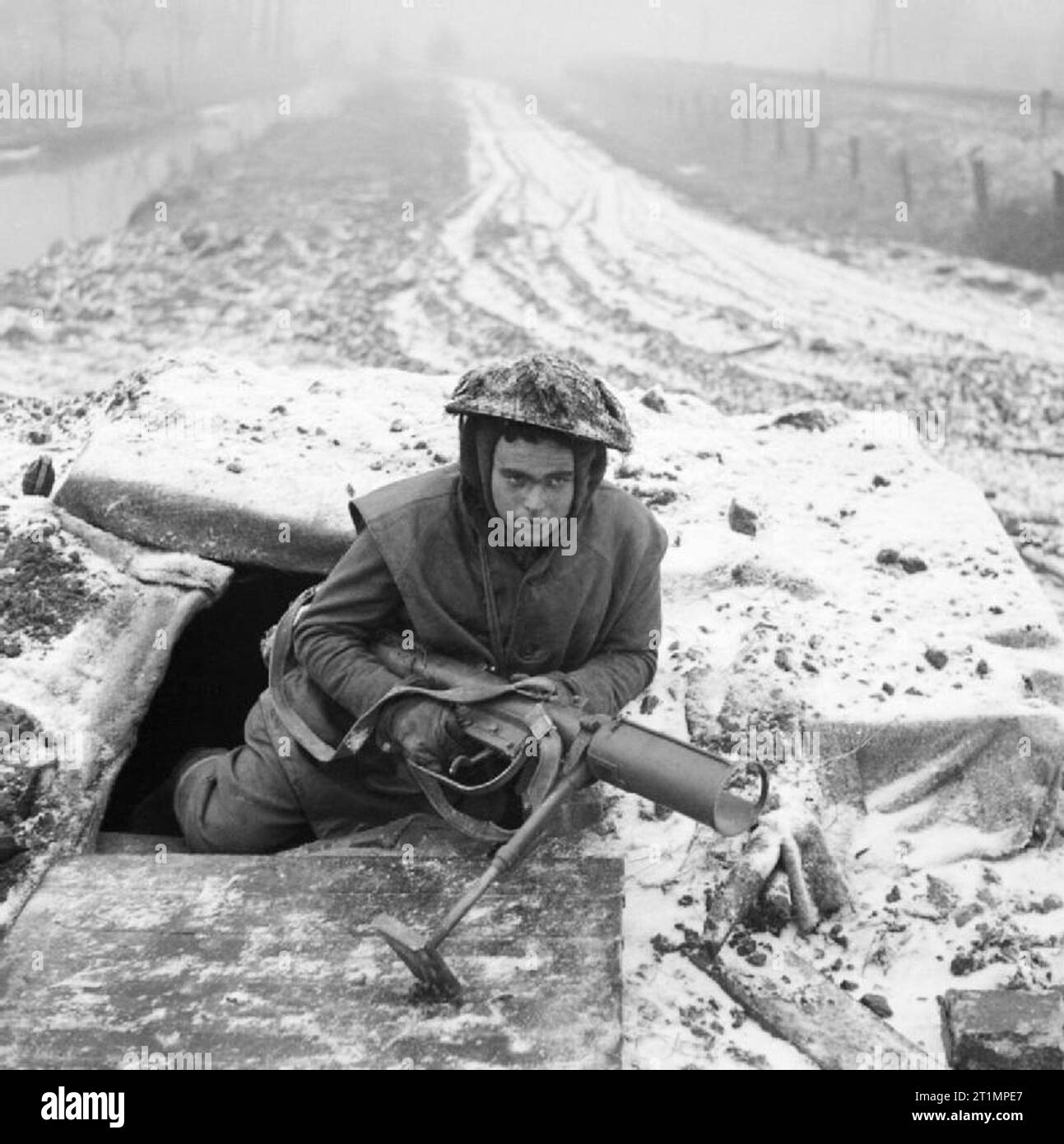 A soldier from the 1st Battalion Rifle Brigade, 7th Armoured Division ...