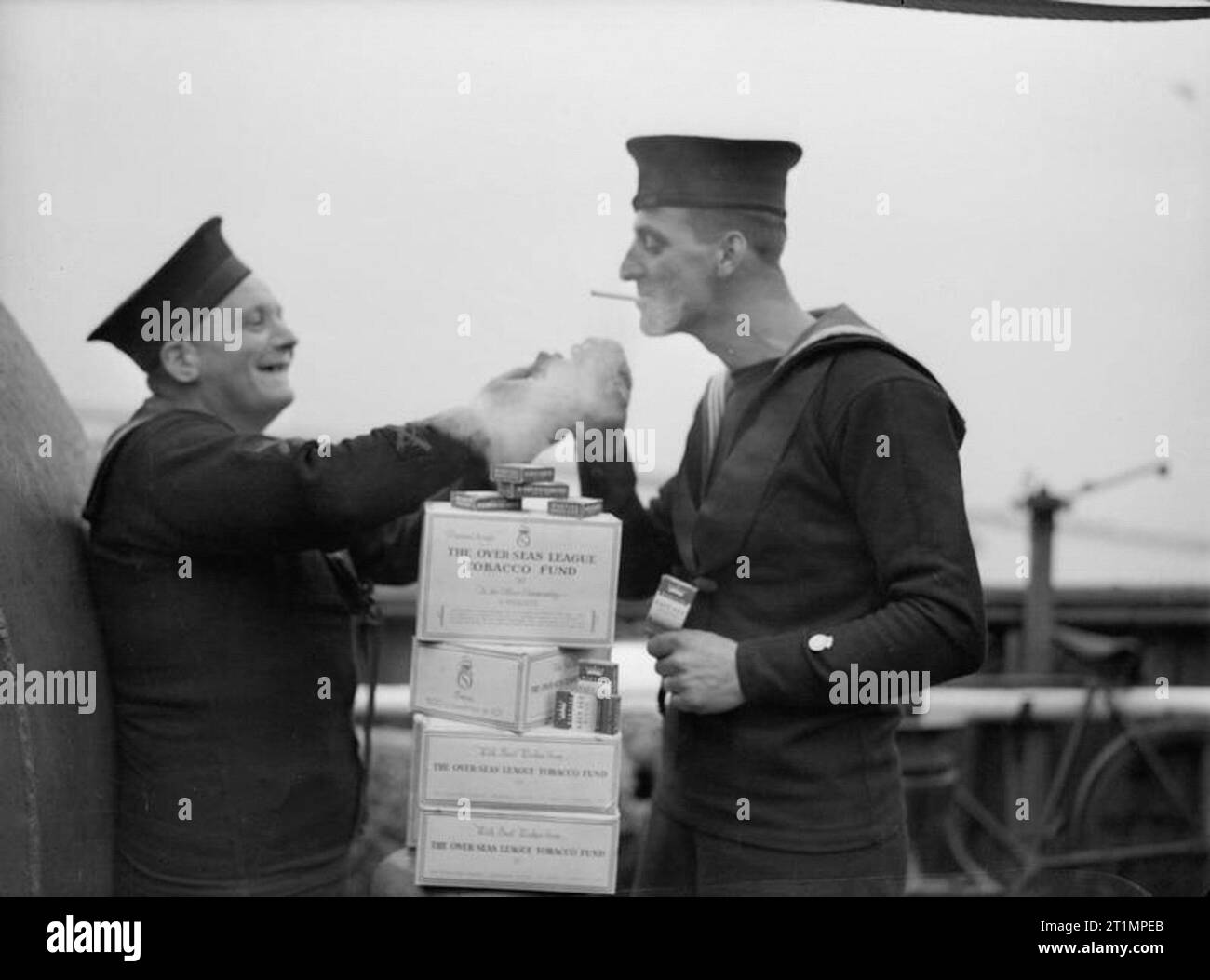 Free Cigarettes For the Royal Navy. 20 November 1942. A member of the ...