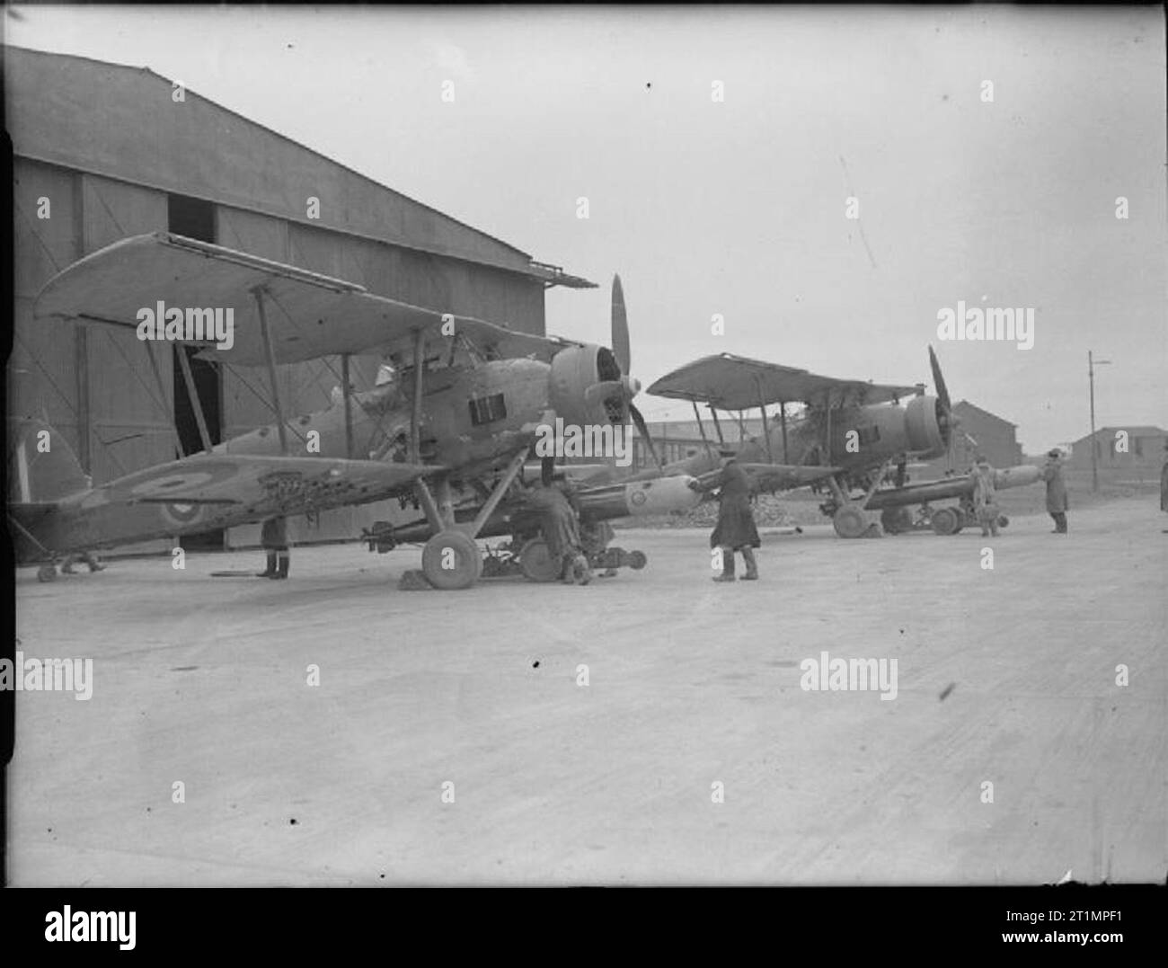 The Royal Navy during the Second World War Loading dummy torpedoes on ...