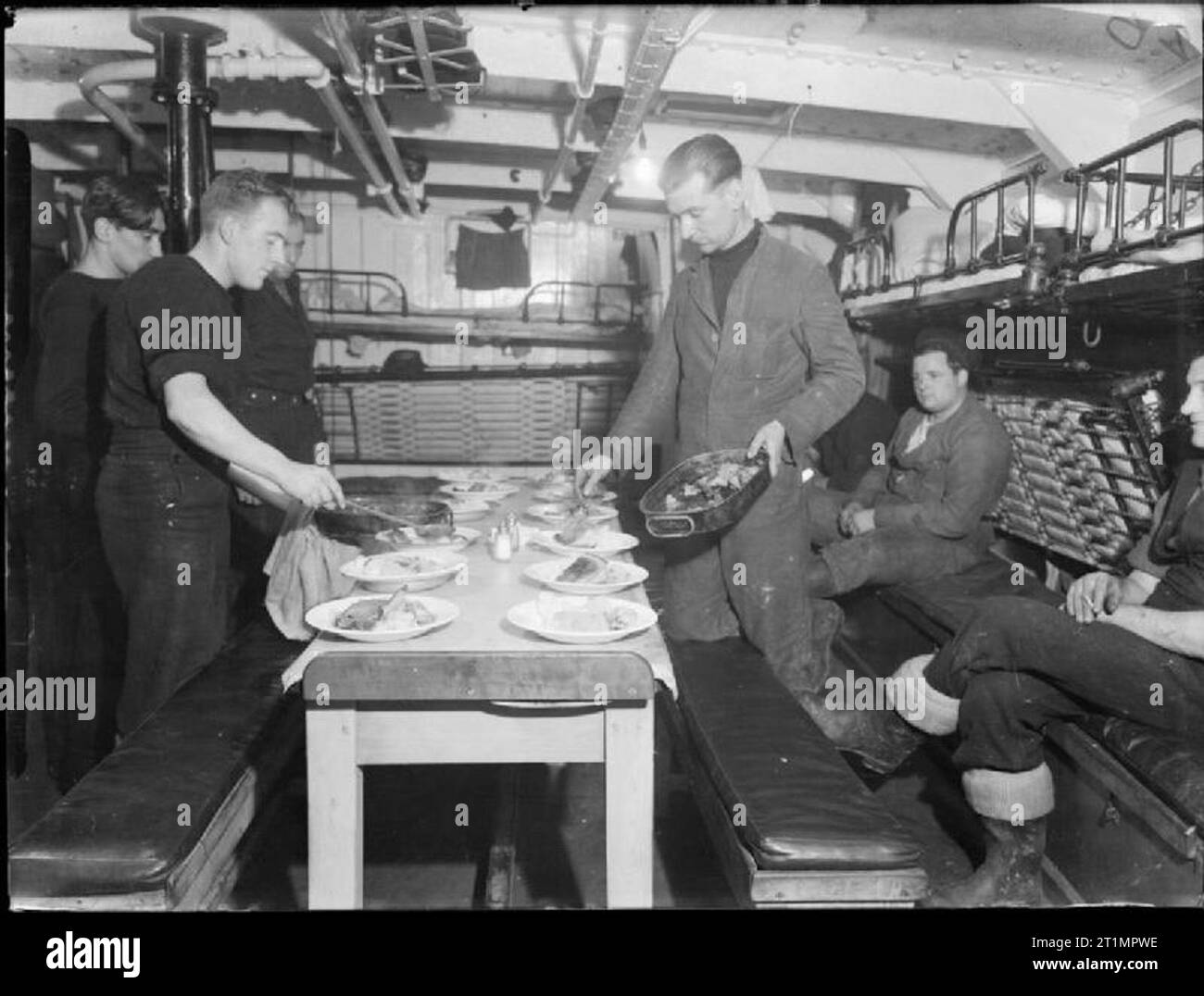 The Royal Navy during the Second World War Serving dinner on the mess ...